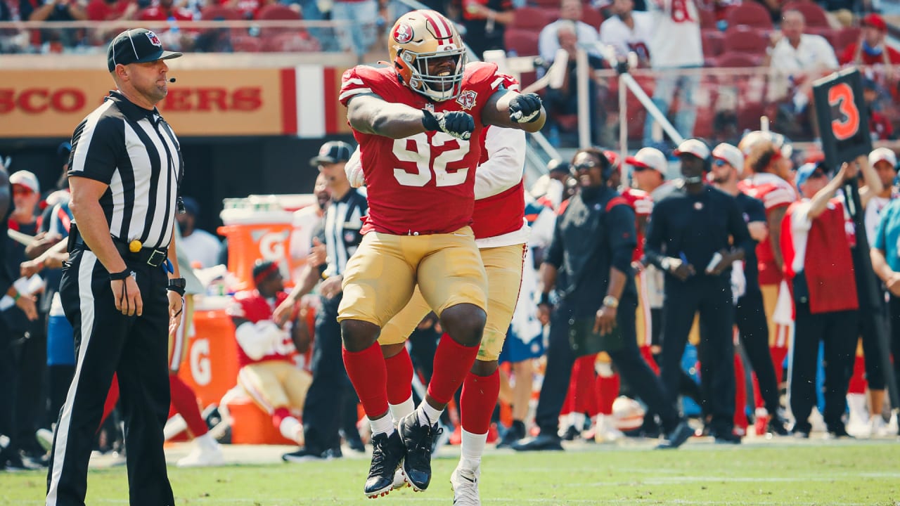 Zach Kerr Celebrates with Teammates Following Fourth Quarter Sack