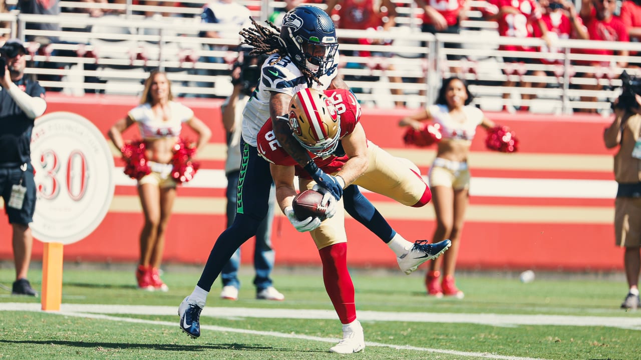 Ross Dwelley Muscles His Way into the End Zone for a 49ers TD
