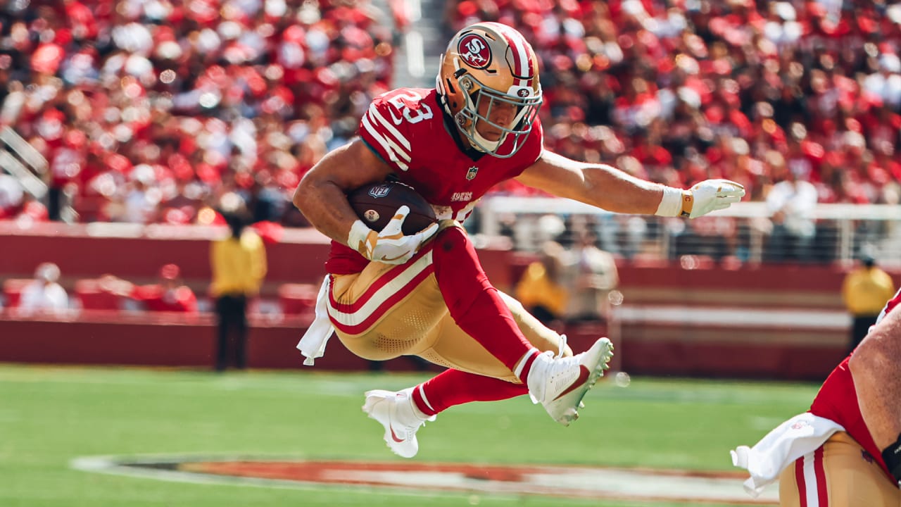 Christian McCaffrey Hurdles Cardinals Defender On the Way to his Second TD
