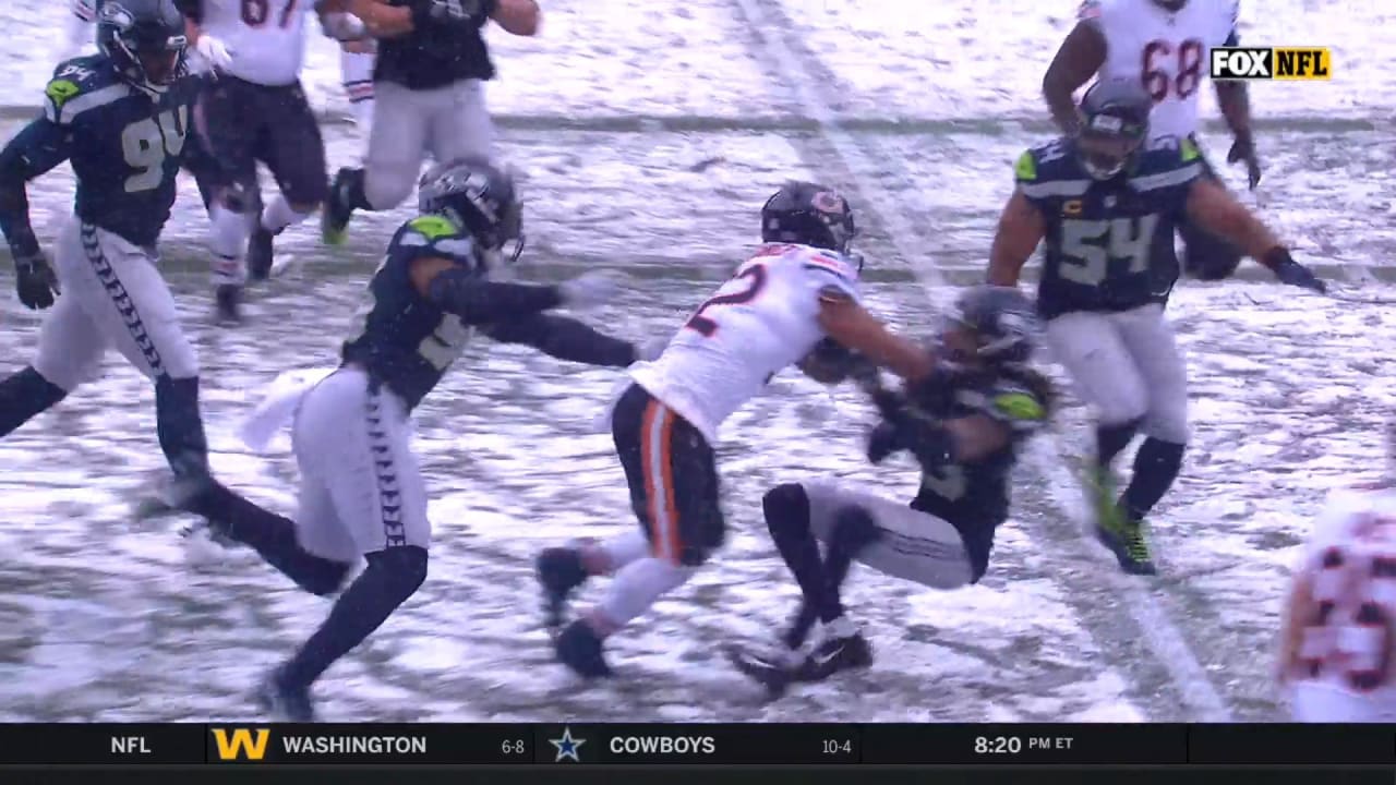 David Montgomery's truck stick plants Seahawks DB into ground