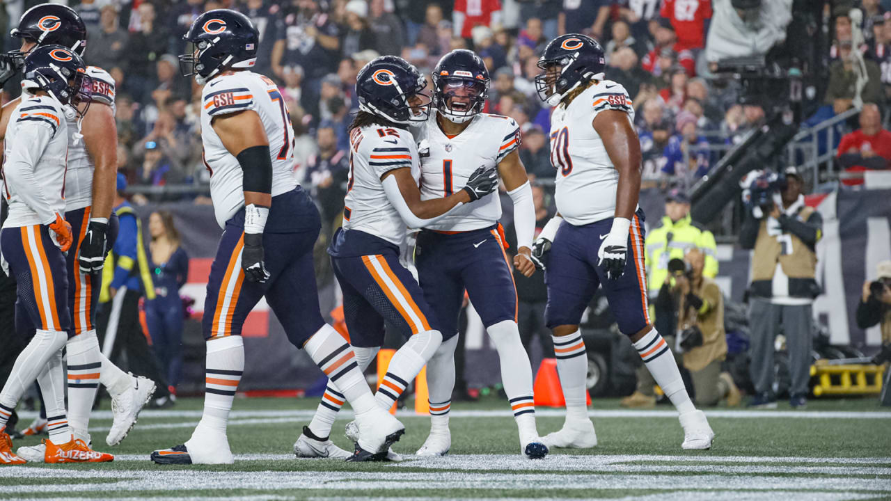 Justin Fields powers for a 3-yard TD run