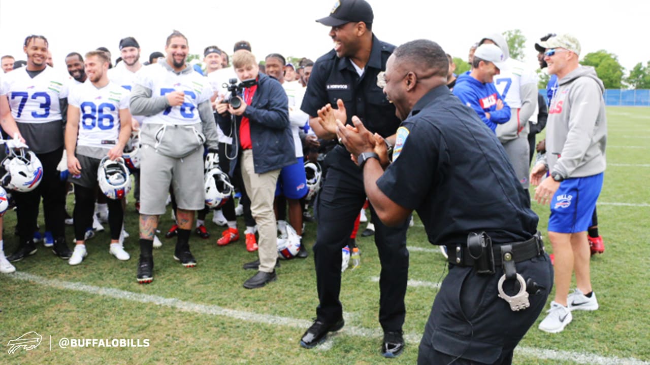 Buffalo’s own "Singing Cops" perform for Bills at OTA practice