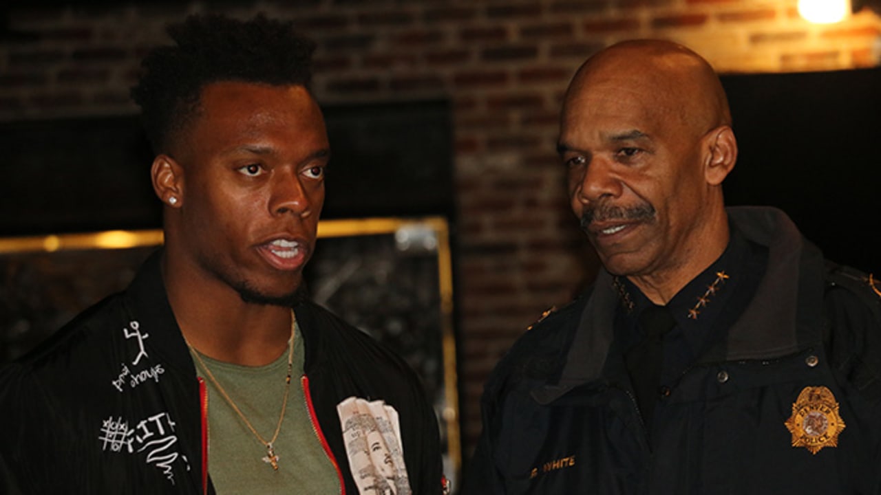 Marshall joins police chief at holiday event