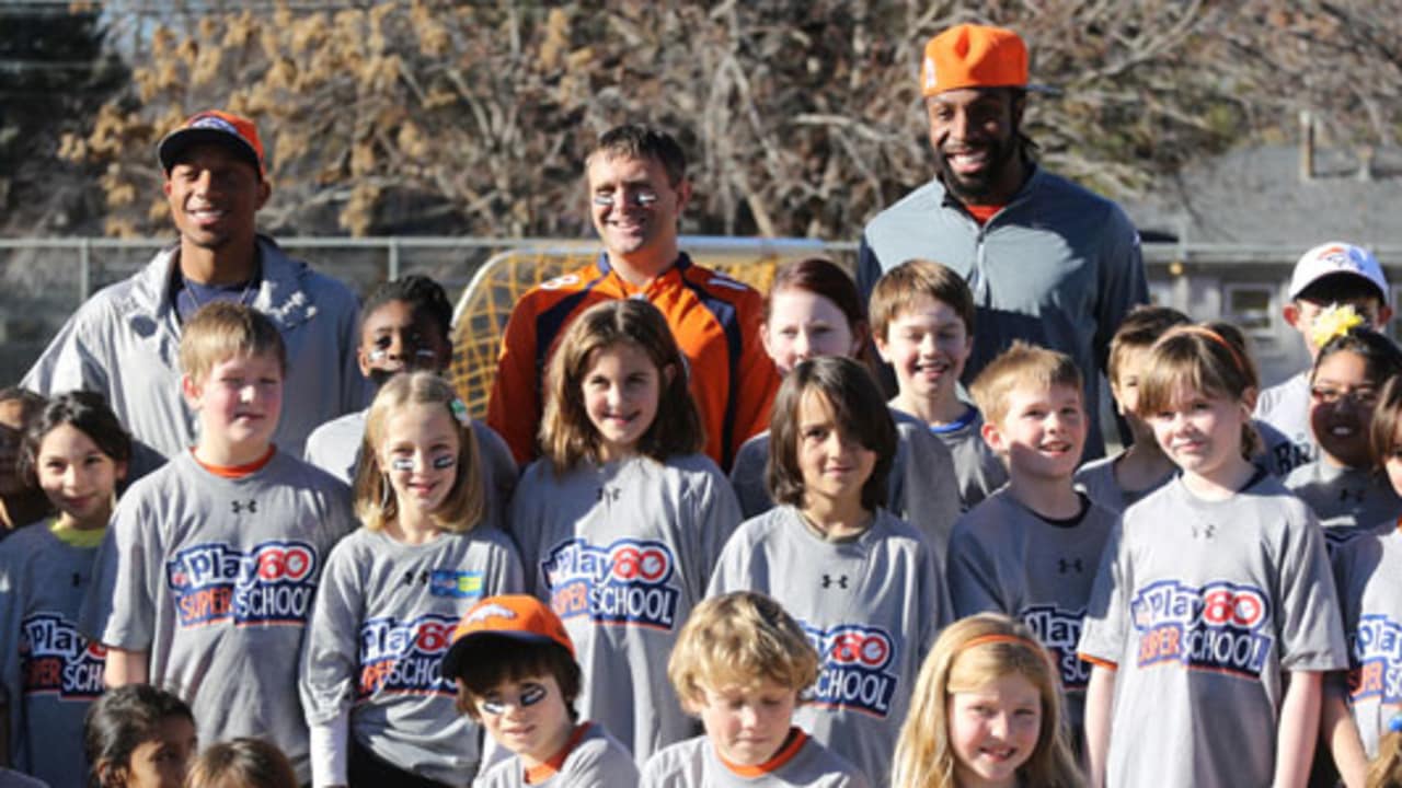 Broncos Help Award $10,000 Grant to Local School