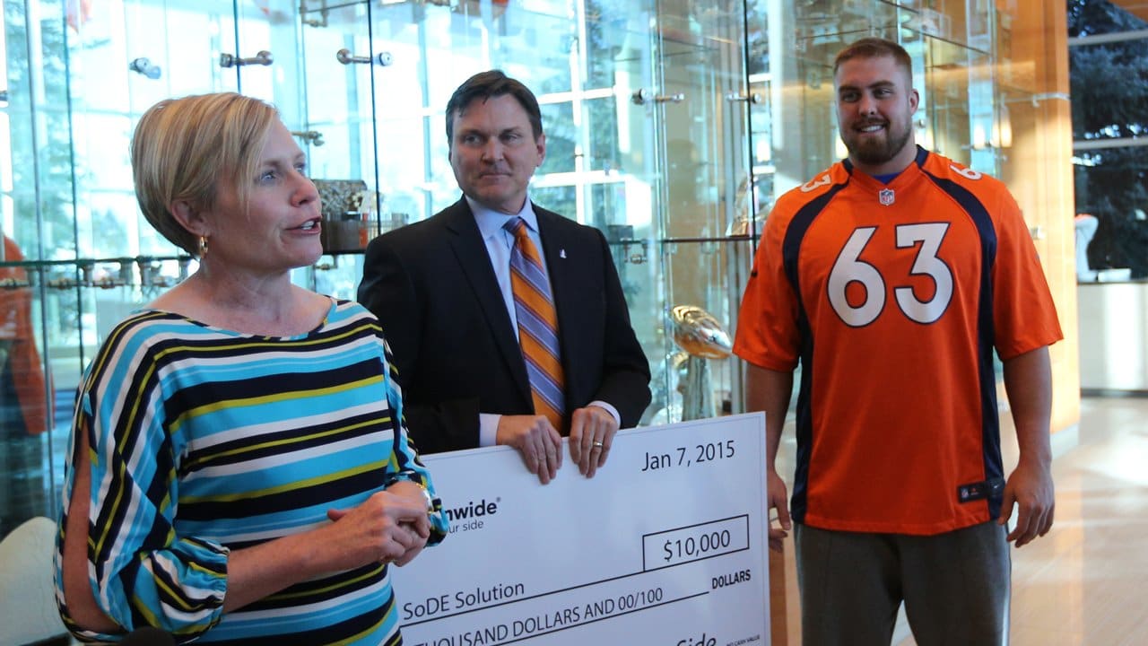 Garland presented with $10,000 donation Garland presented with $10,000 donation