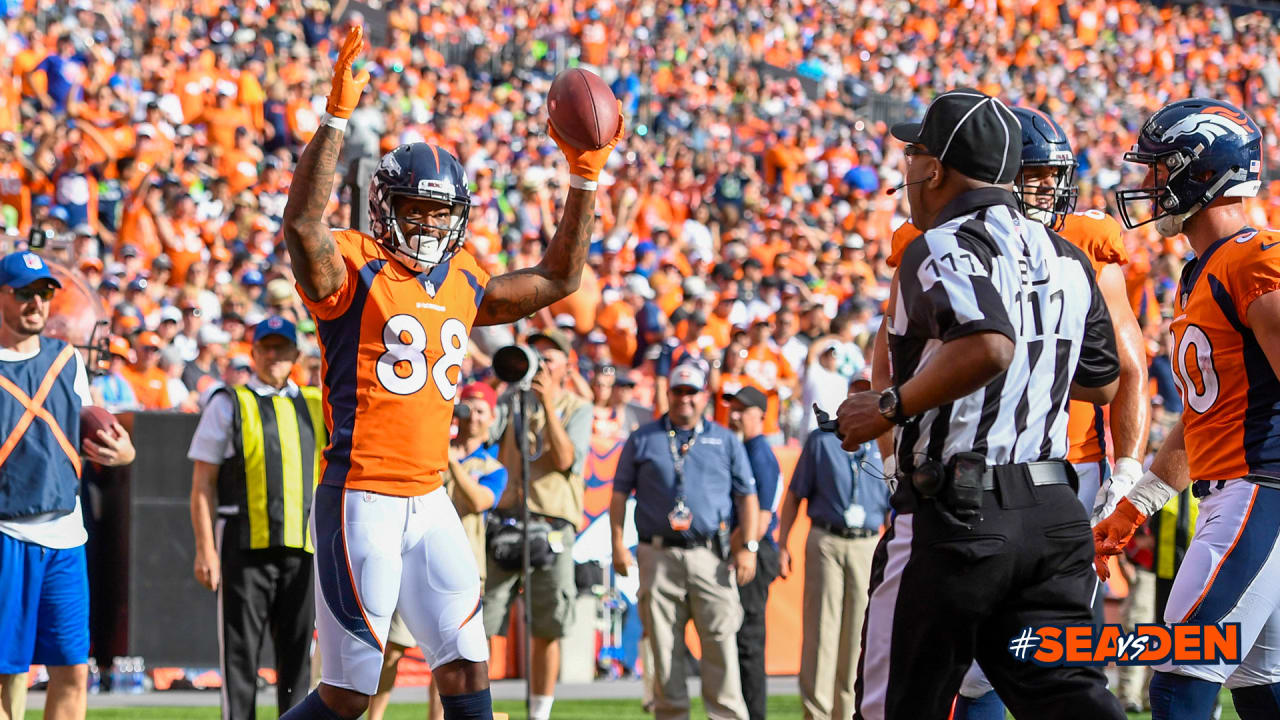 Thomas, Sanders push Broncos' offense to season-opening win