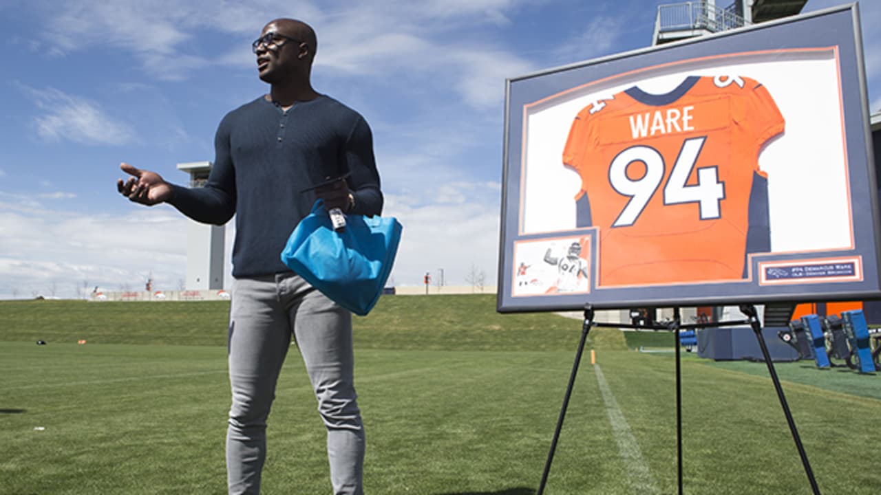 Ware honored during visit to Broncos practice