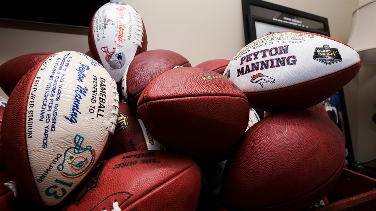 Photos: A peek inside Peyton Manning's game ball collection