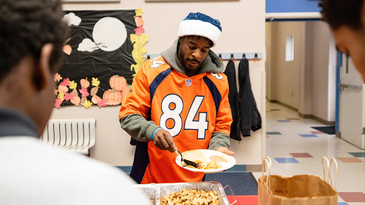 Photos: Broncos host holiday event at Marvin W. Foote Youth Services Center