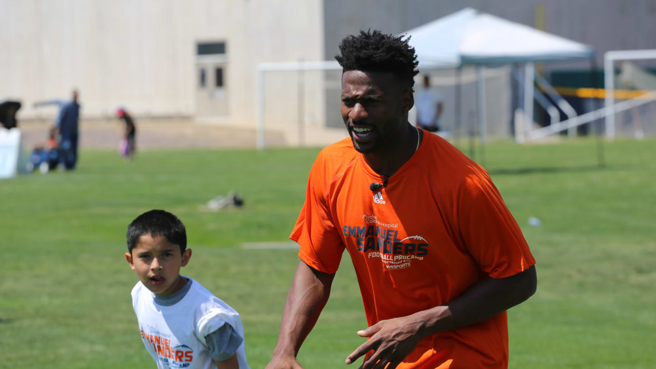 Emmanuel Sanders holds annual youth football camp