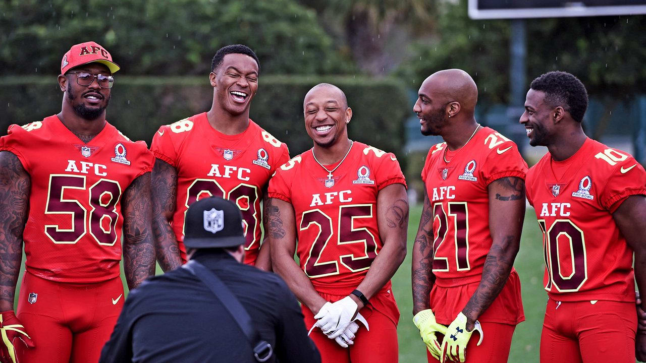 Different jersey, same players: Broncos players pose for AFC photo day