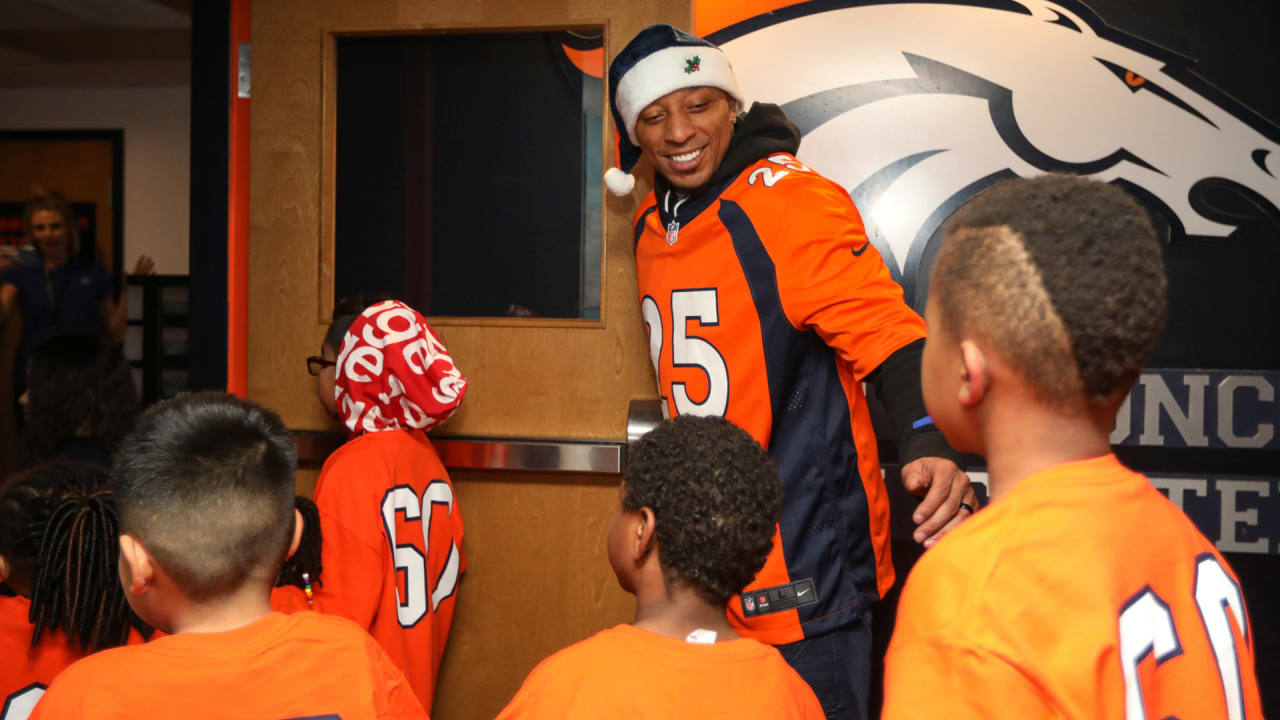 Broncos get in the holiday spirit at Denver Rescue Mission's 20th ...