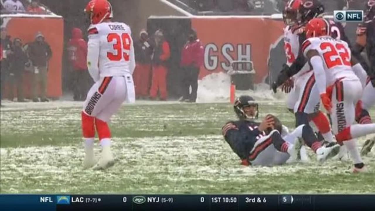 Cleveland Browns safety Justin Currie successfully blitzes for a sack