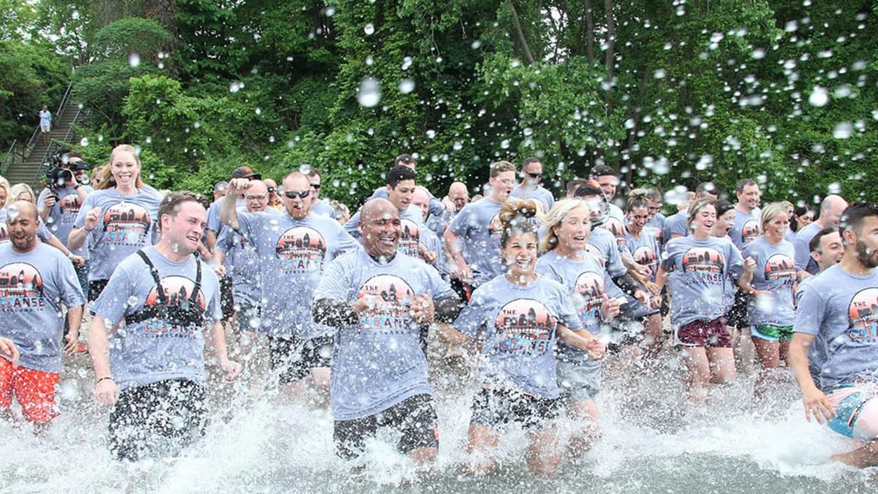 Photos: Hue Jackson fulfills promise to jump in Lake Erie