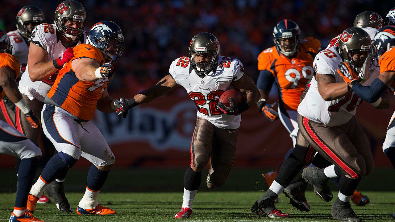 Photos: Bucs vs. Broncos Through the Years