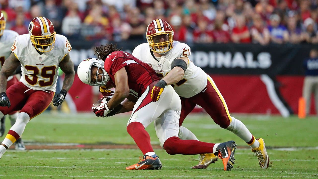 Photos: NFL's 100 Tackle Club