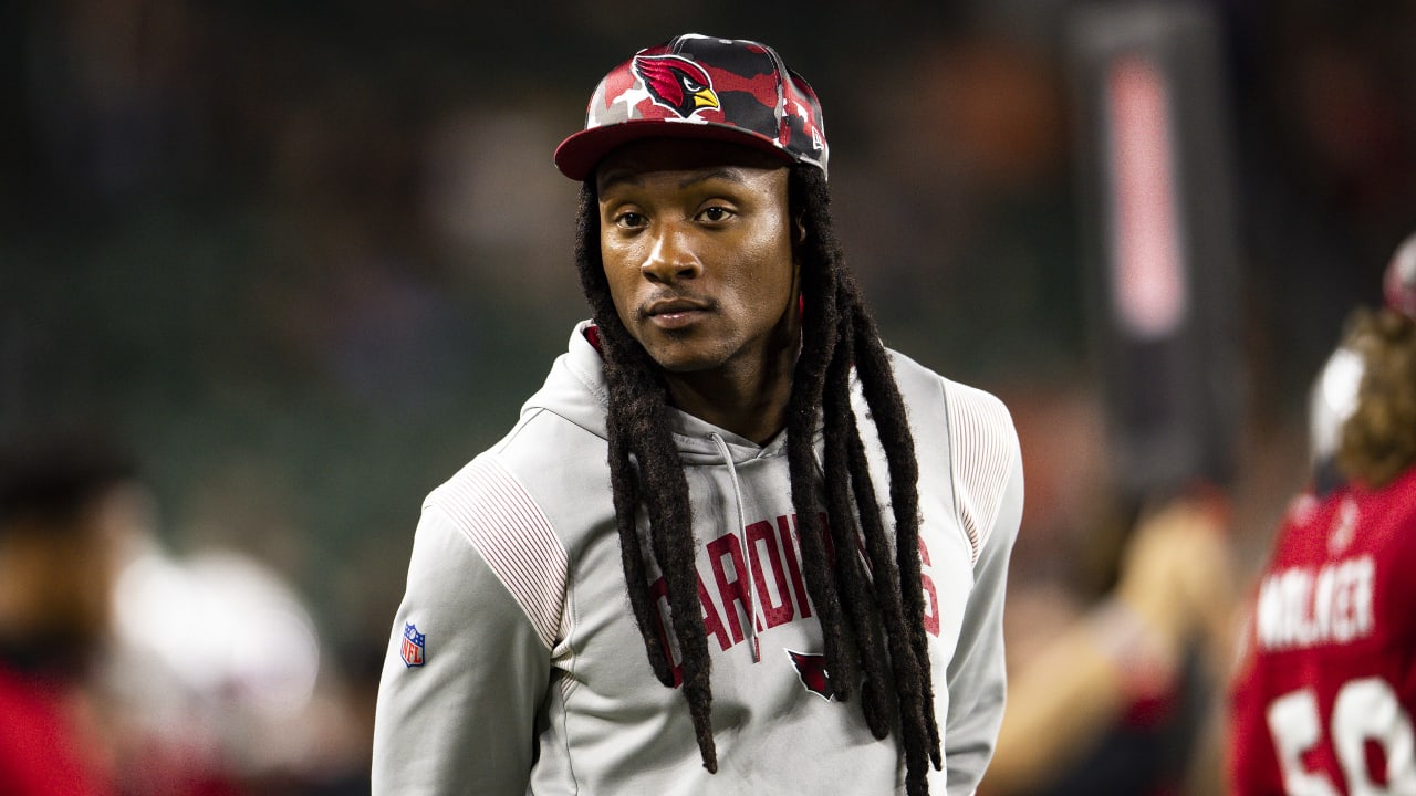 Cardinals WR DeAndre Hopkins in Toronto and not at voluntary work as he works out away from team