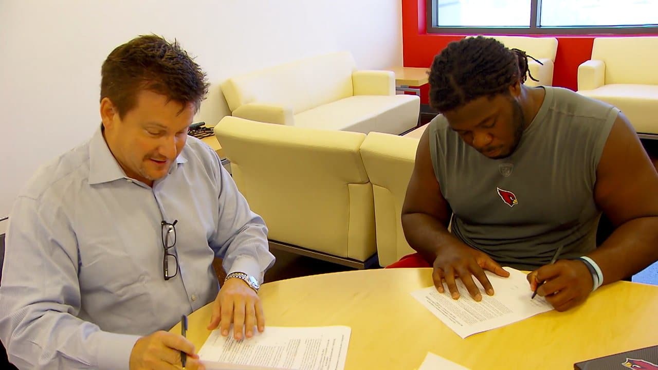 EXCLUSIVE: Watch Cooper sign his contract