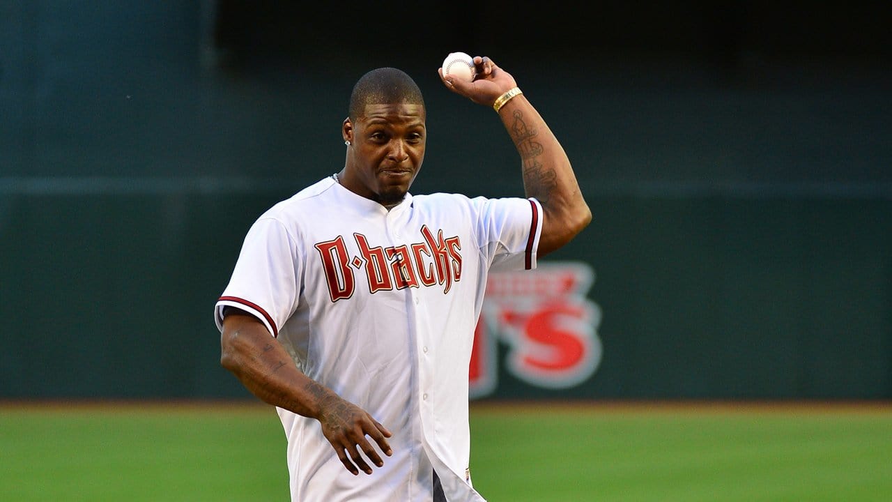 Adrian Wilson throws first pitch