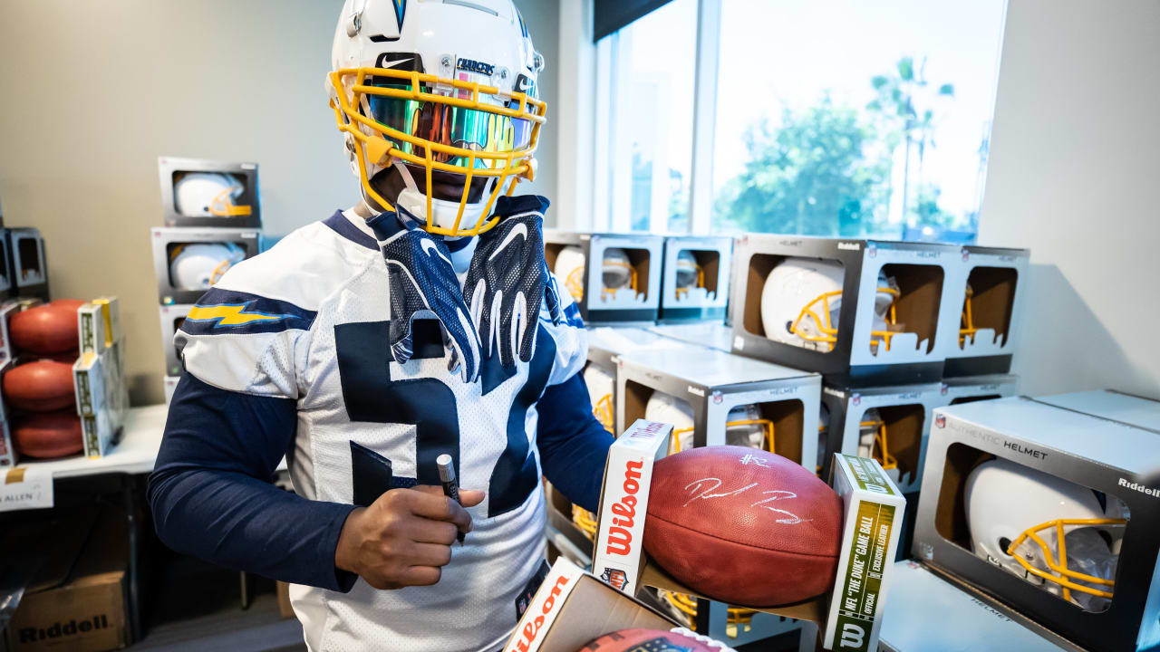 Photos: Chargers Players Sign Items for NFL Auction