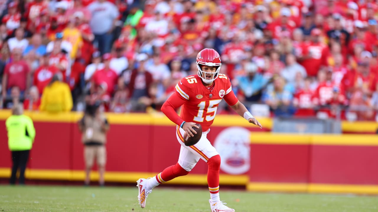 Kansas City Chiefs quarterback Patrick Mahomes runs for a 23-yard gain on third-and-15