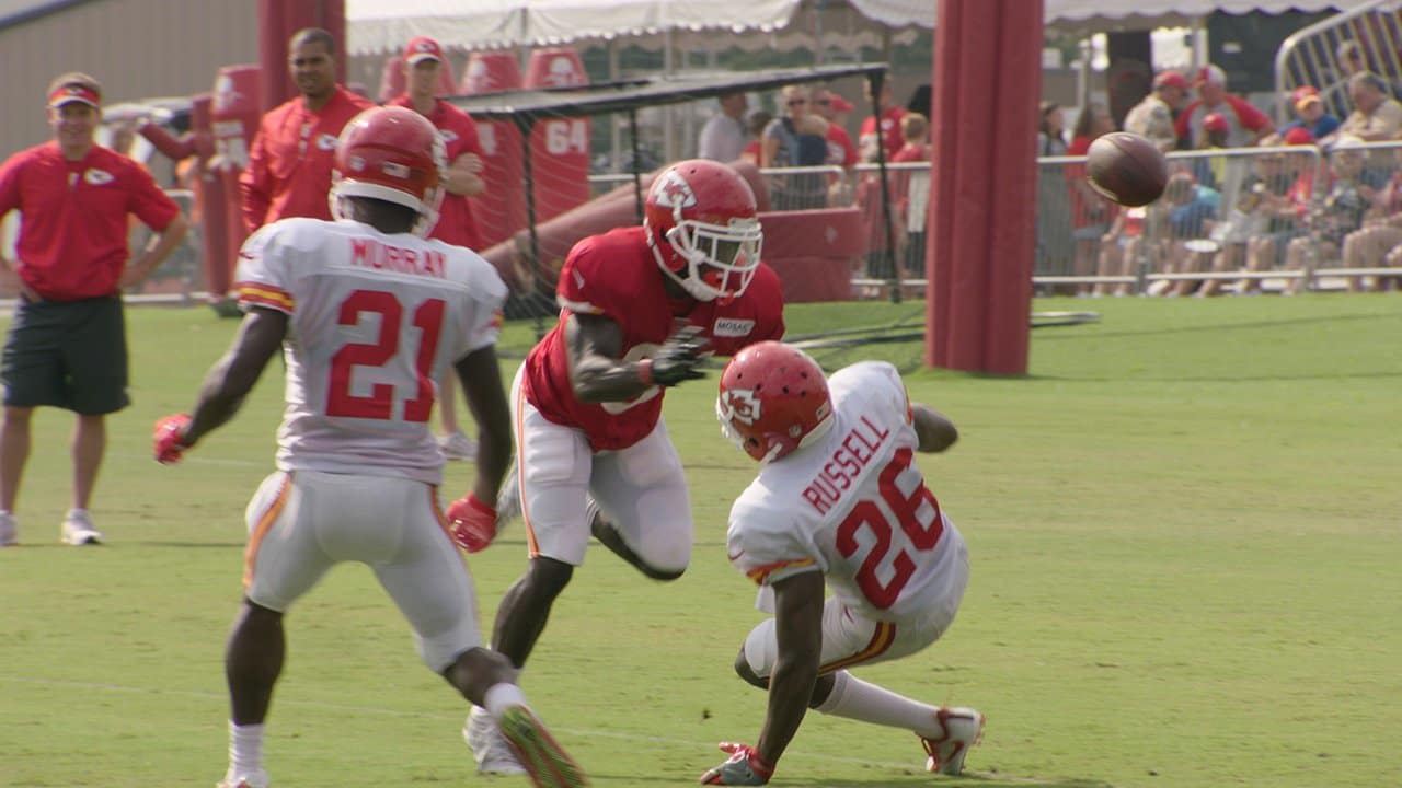 Russell Reaches in to Break Up Pass