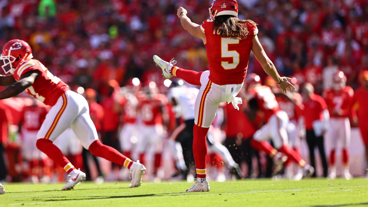Kansas City Chiefs punter Tommy Townsend drops a 55-yard punt inside ...