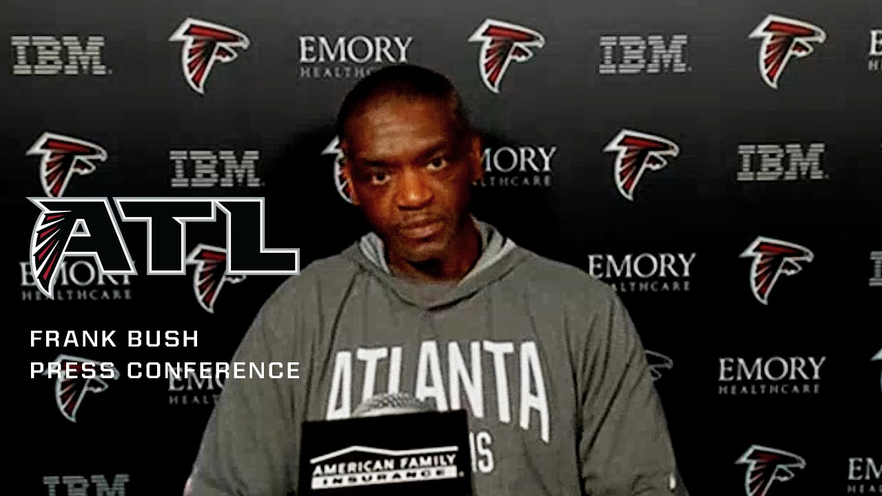 Linebackers coach Frank Bush speaks to the media