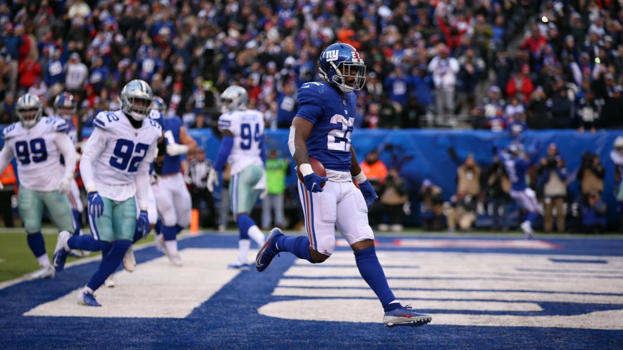 Wayne Gallman stiff-arms defender to the turf on TD run