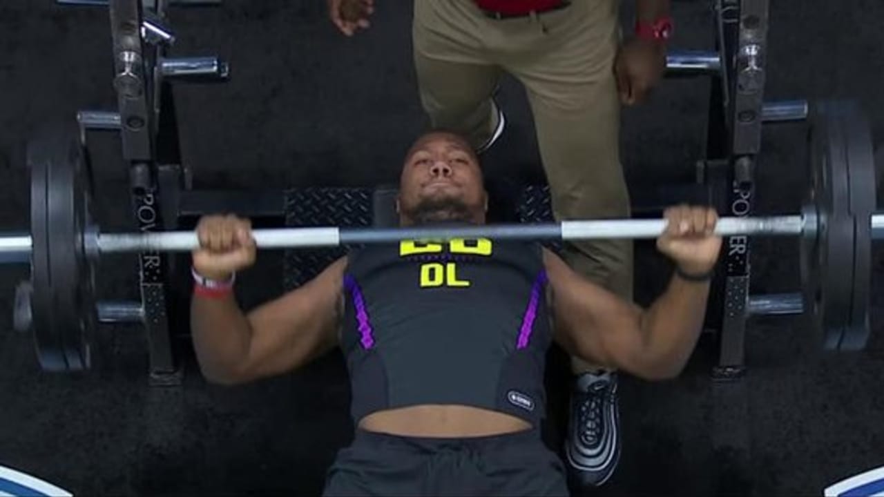 Defensive linemen show out on the bench press