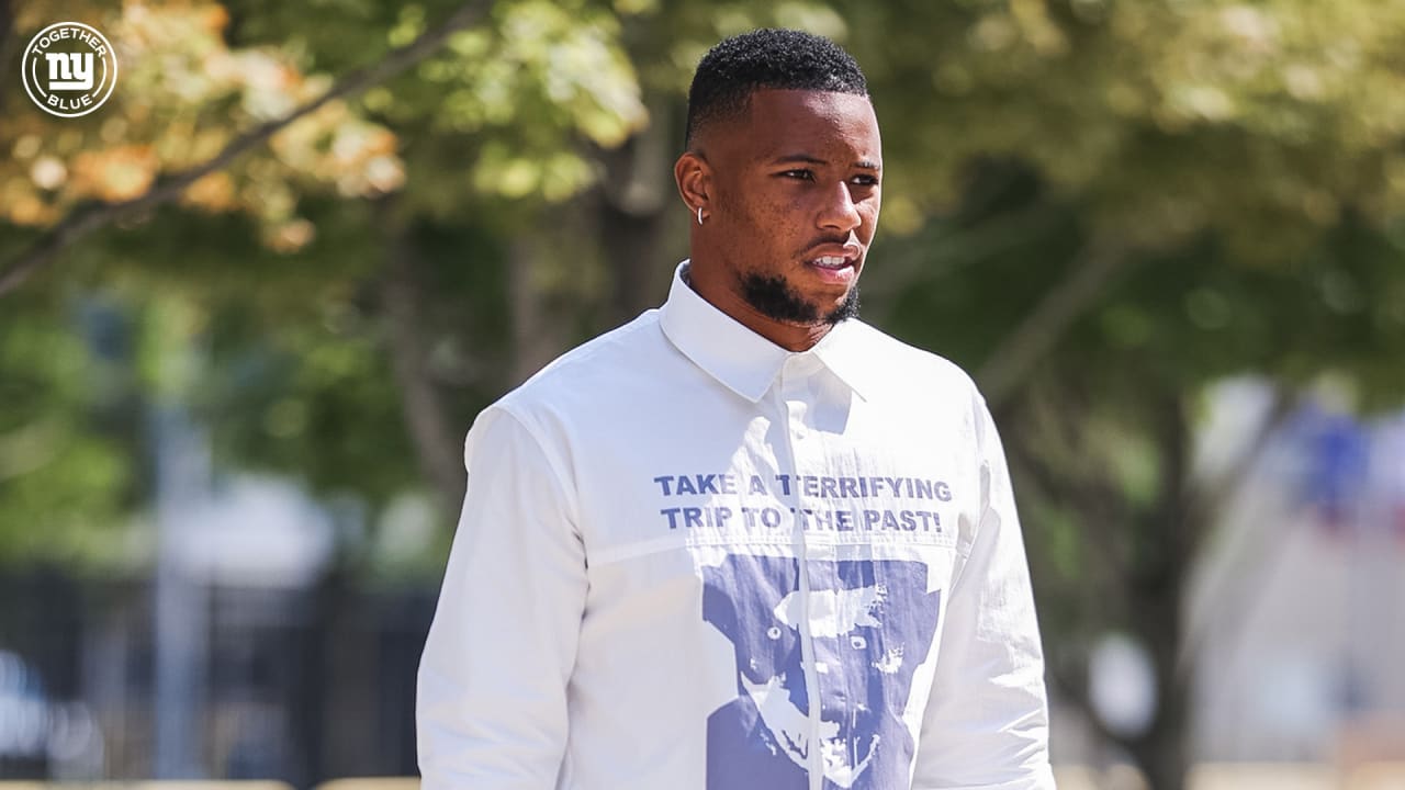 Giants arrive for season opener vs. Broncos