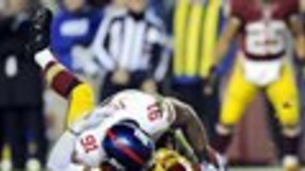 Justin Tuck sacks Redskins season