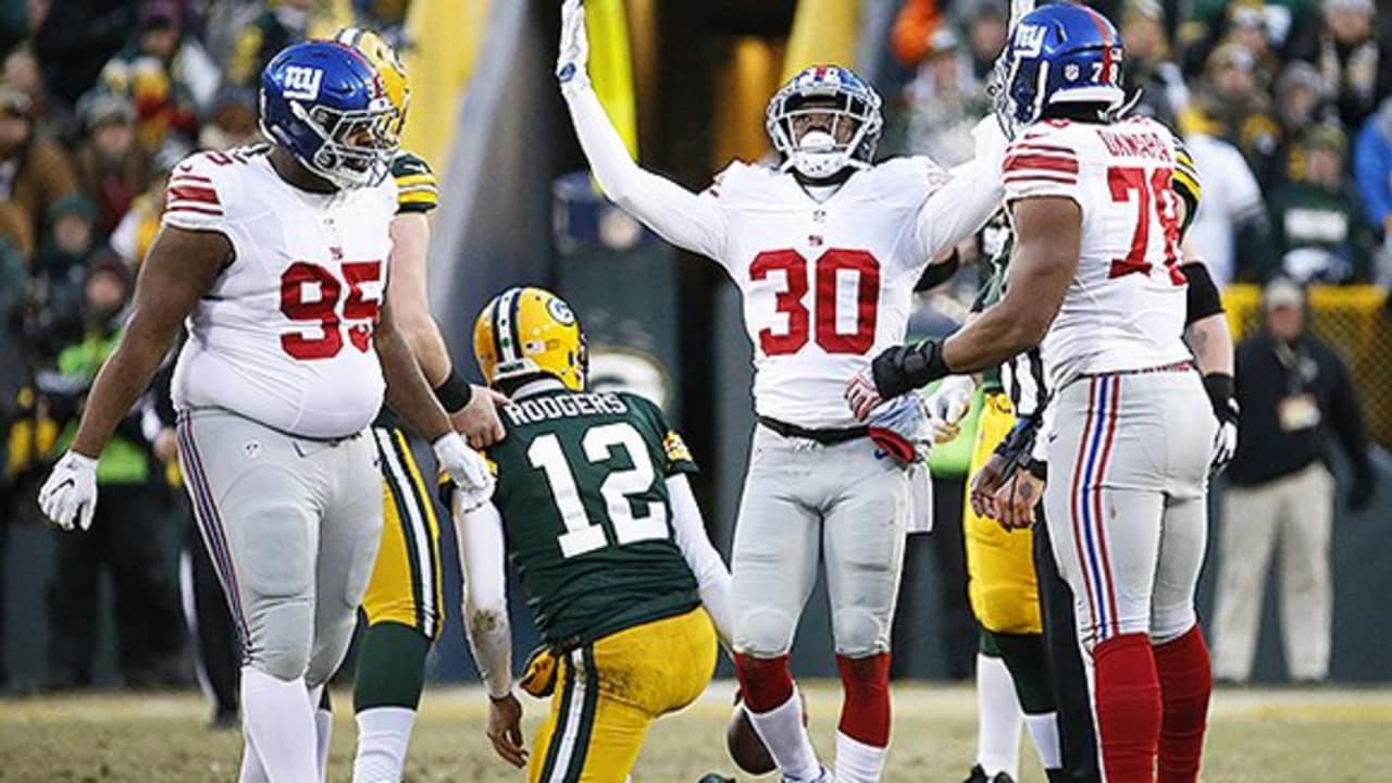 Coty Sensabaugh sacks QB Rodgers for a loss of 11