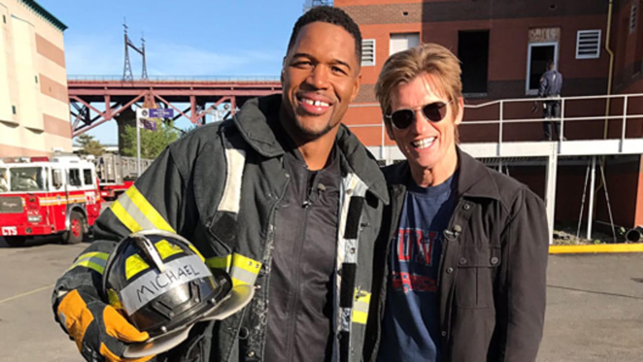 Michael Strahan suits up on Firefighters Day