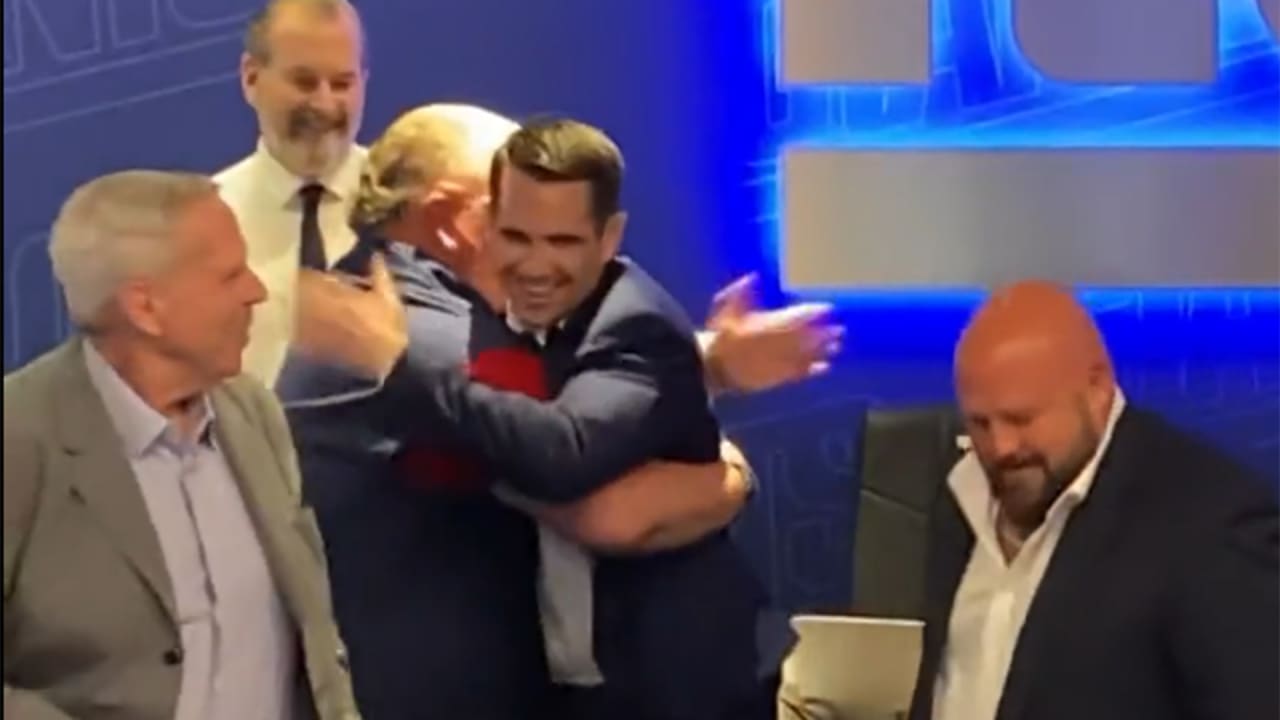 Wink Martindale bear hugs Joe Schoen after Deonte Banks pick