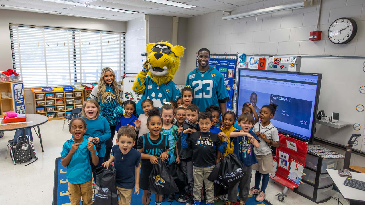 Photos | Touchdown for Literacy: LB Foye Oluokun and S Daniel Thomas ...