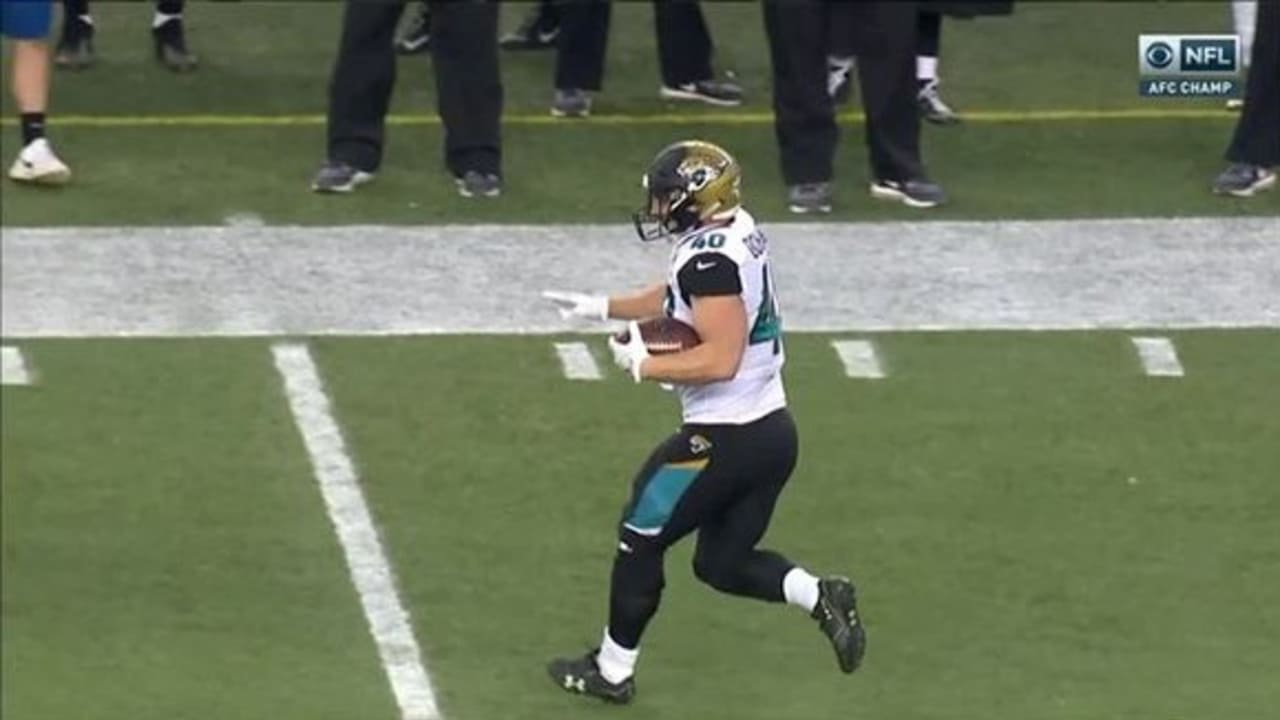 Jacksonville Jaguars fullback Tommy Bohanon runs over New England ...