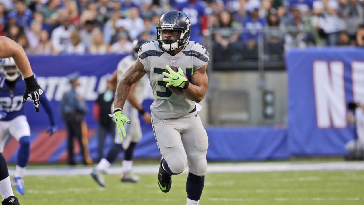 Running back added: Rawls signs