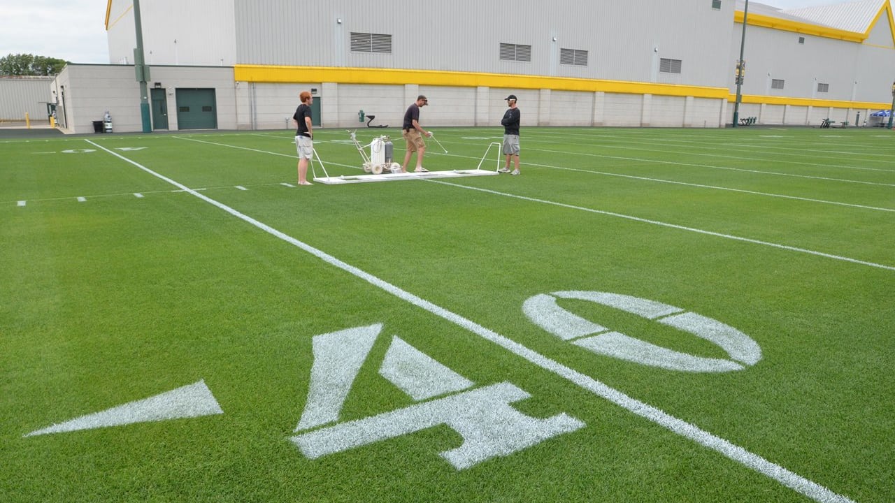 Packers grounds crew preps Nitschke Field for 2014 Training Camp