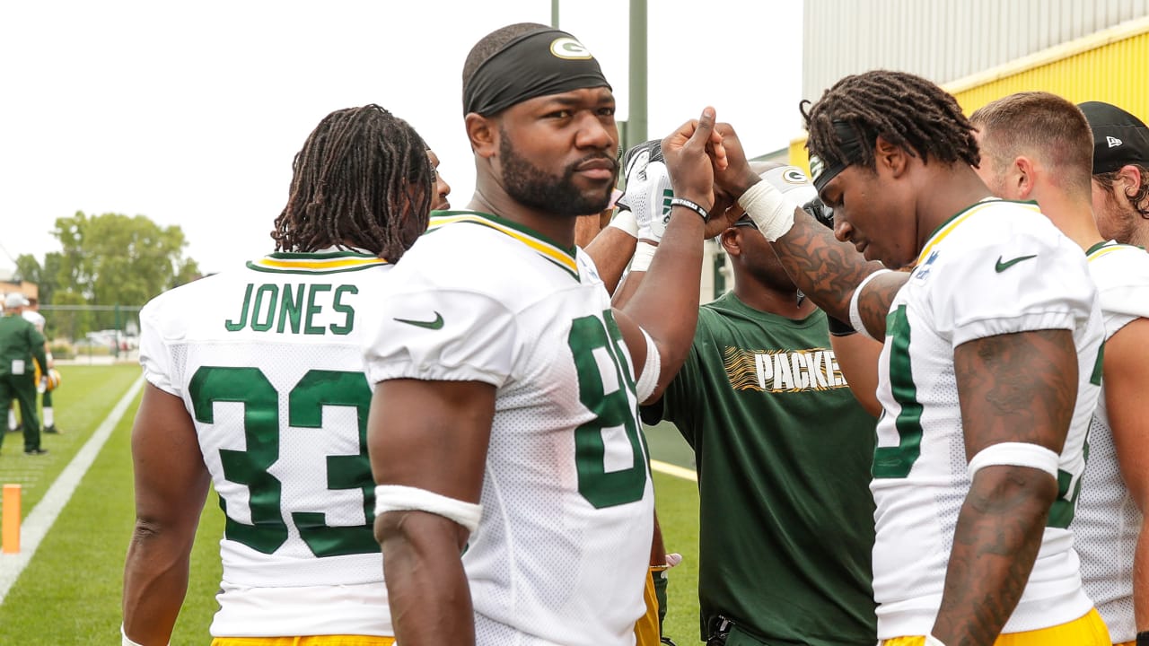 Running backs need 'to jump out' with pads on