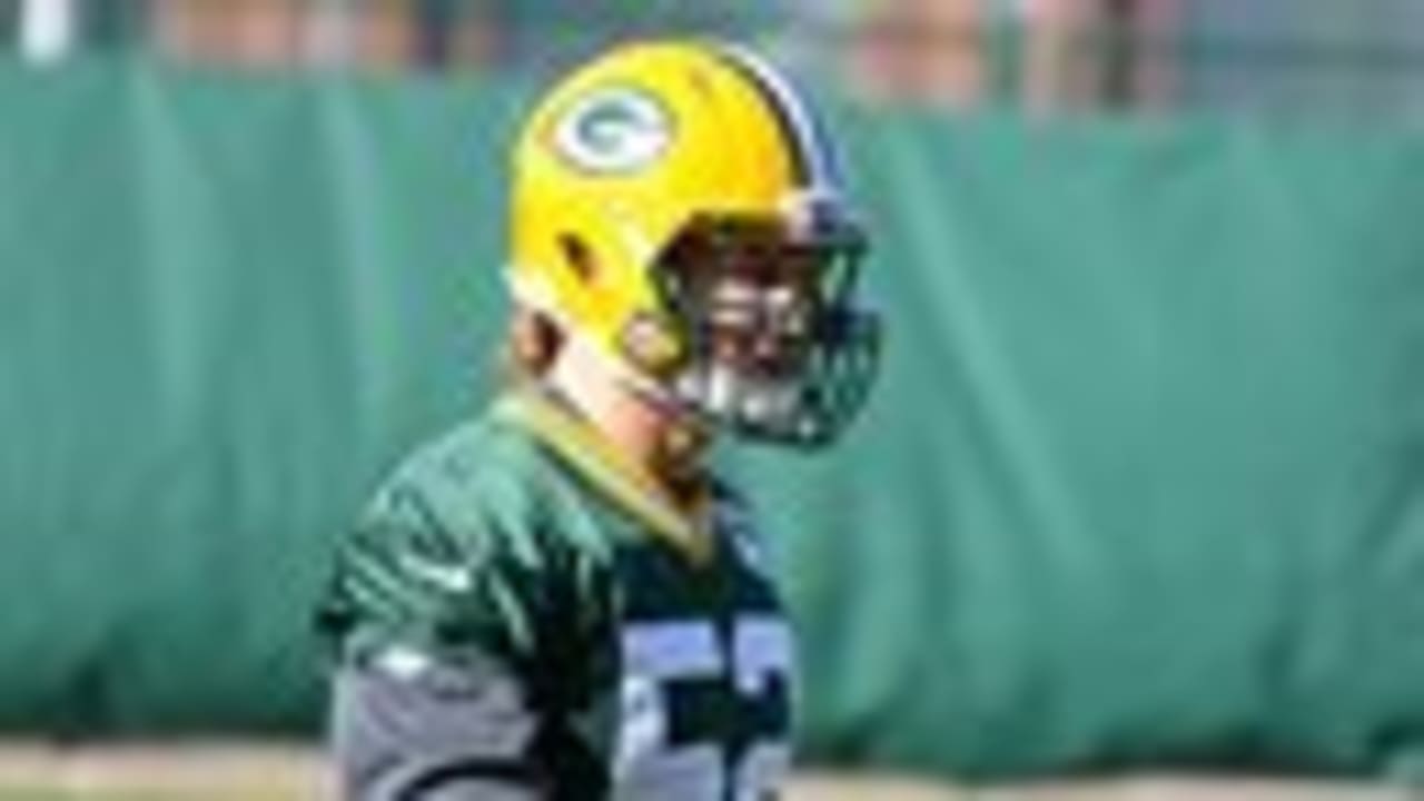 Clay Matthews trying to deal with clubbed up hand