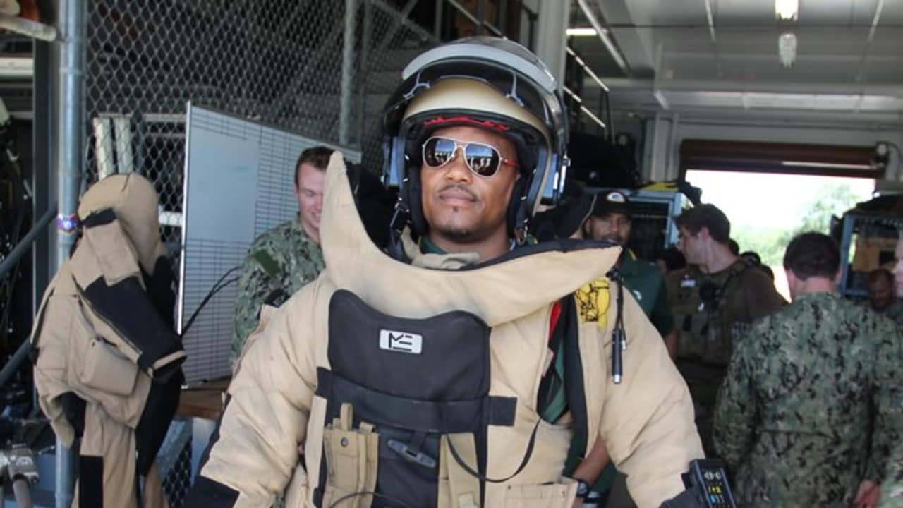 Packers, staff visit military in Okinawa, Tokyo and Guam