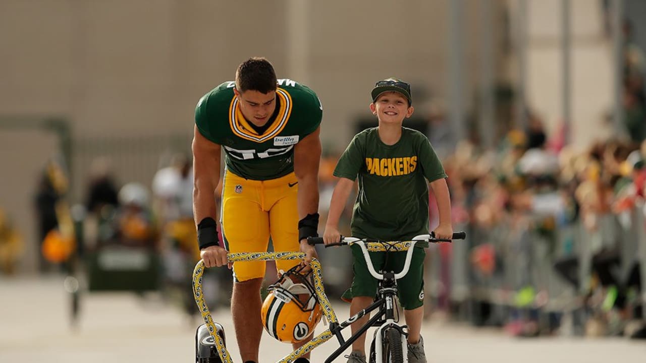 Packers ride bikes to night practice