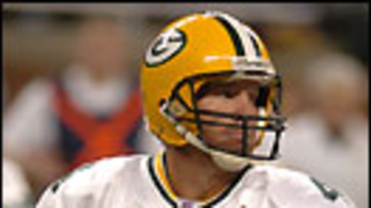 Favre Excels Through Adversity