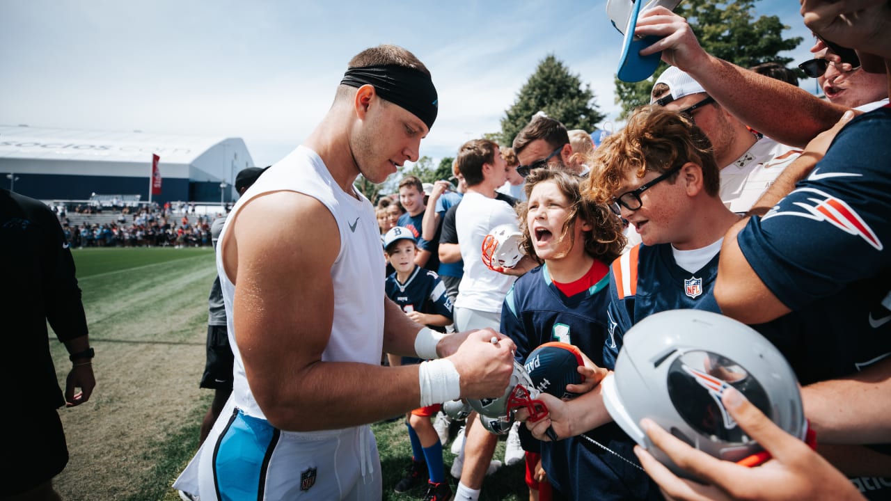 Christian McCaffrey signs autographs for Patriots fans