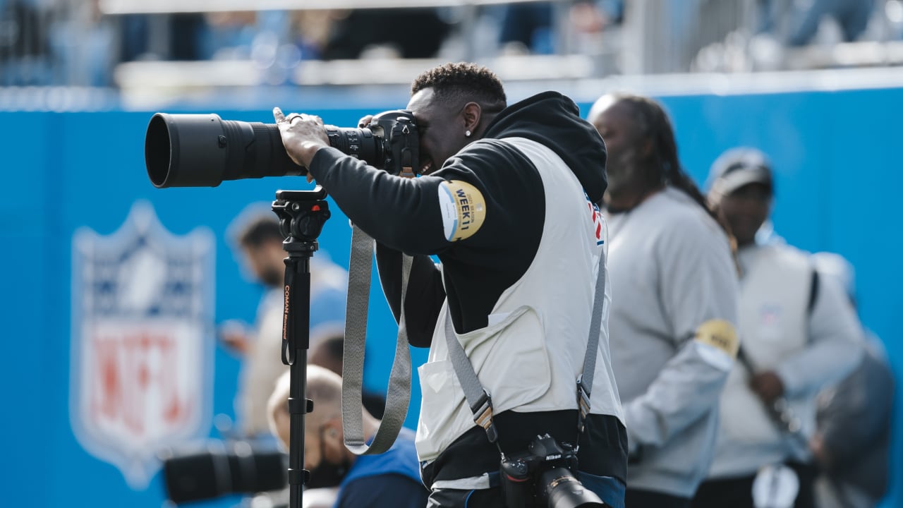 Thomas Davis works as a photographer for a day at Panthers game