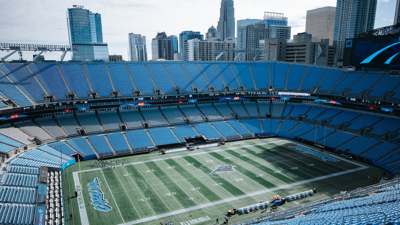 Panthers paint field with throwback logos
