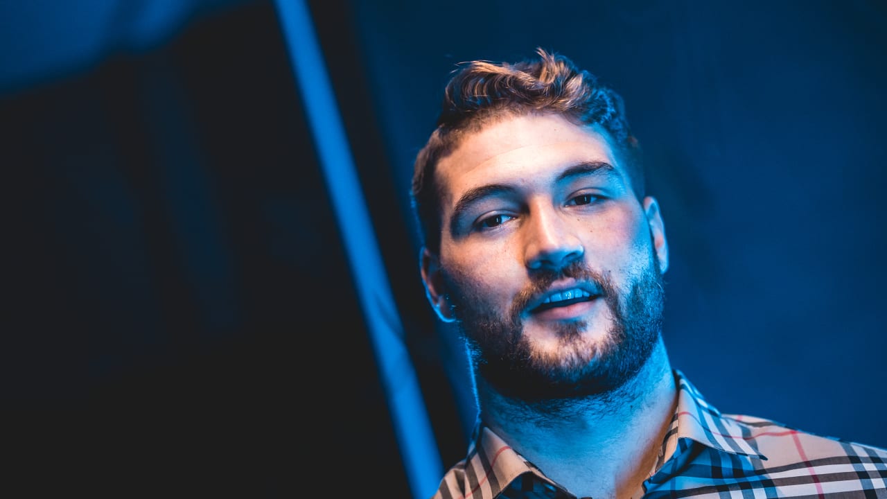 Morgan Fox signs as a Carolina Panther