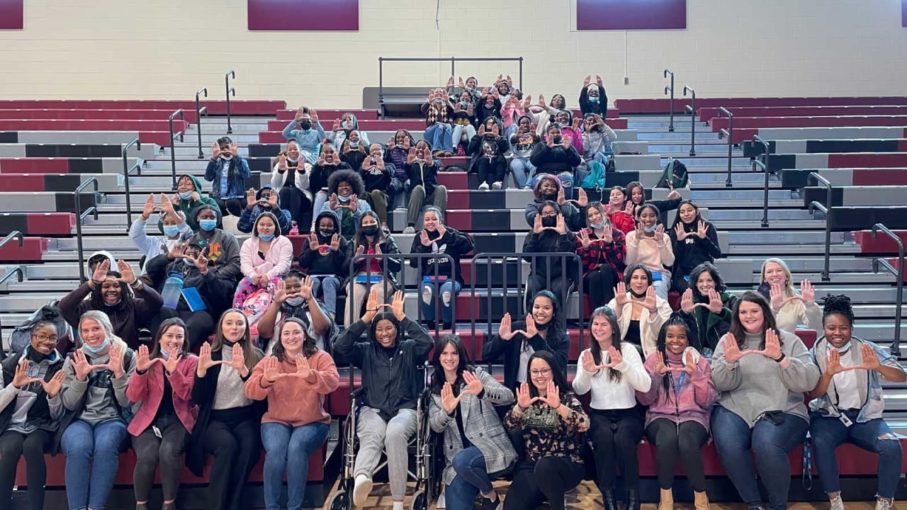 Panthers employees speak to female athletes at Harding High School for ...