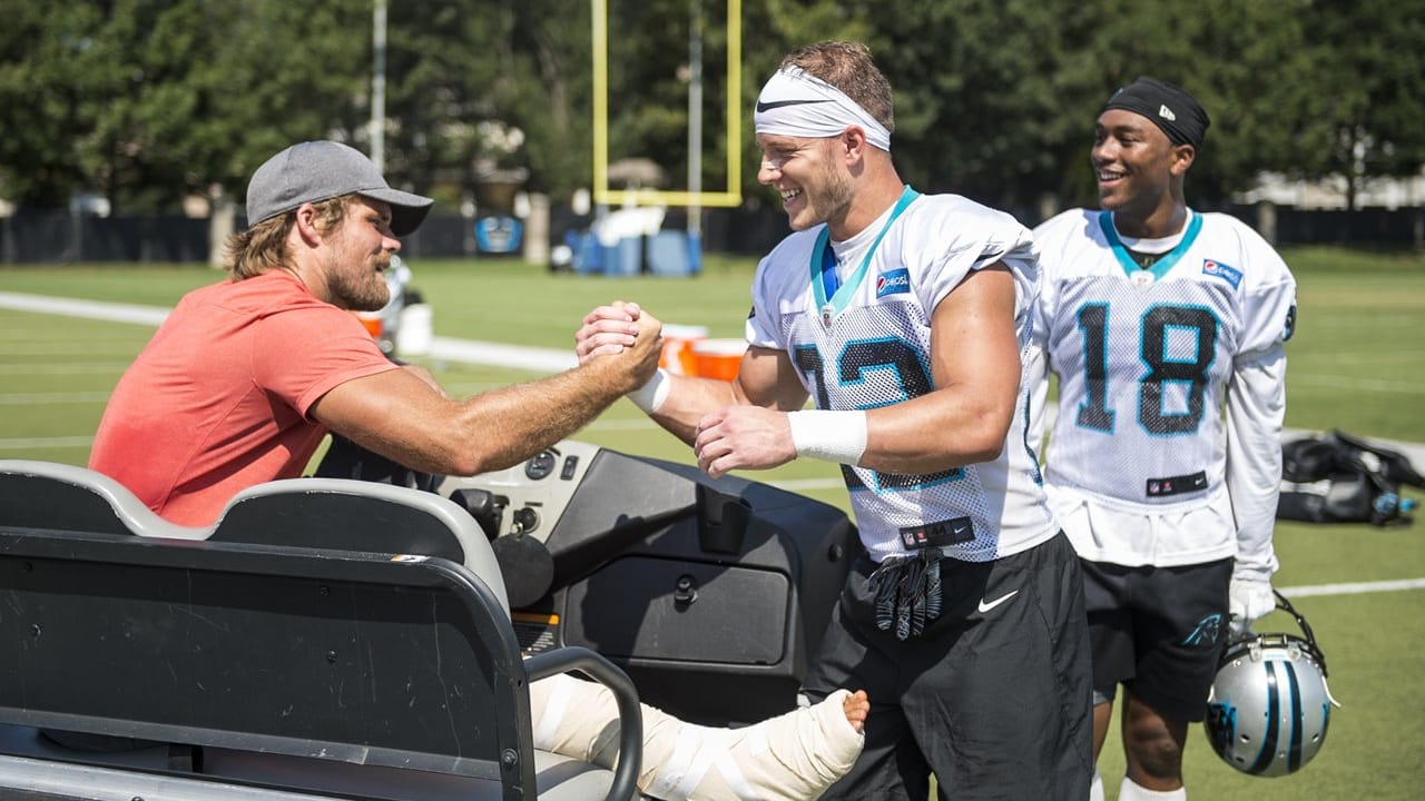 Photos: Greg Olsen visits practice